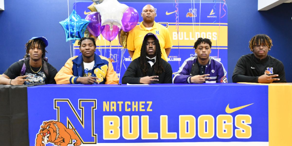 Natchez High School football players commit to playing colle...