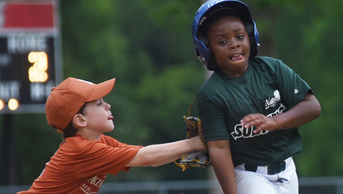 Atkins Lumber holds on to beat Subway 6-5 in the rain