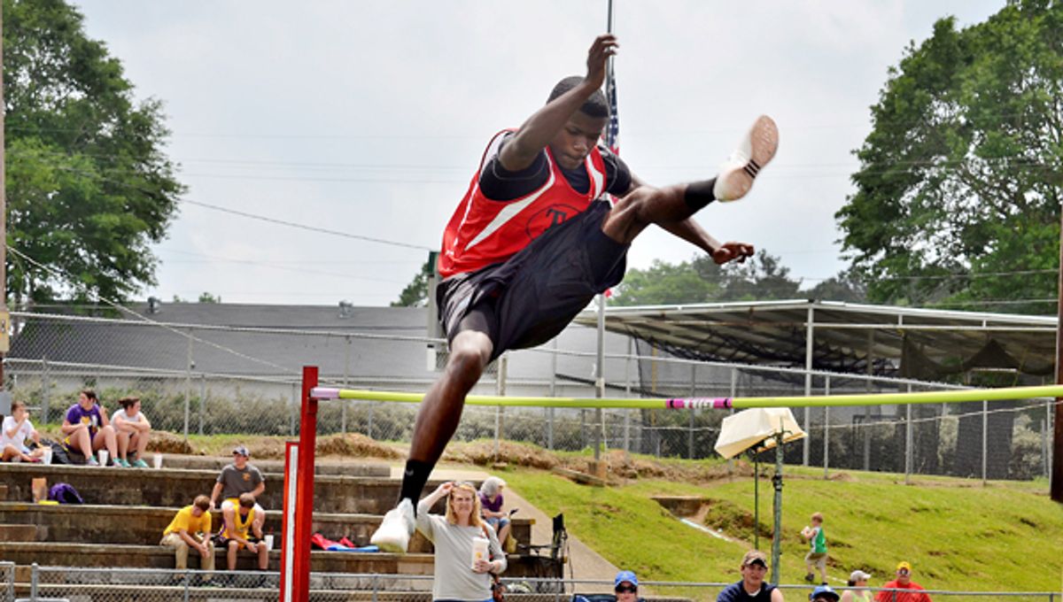 Trinity's McCoy wins 3 events at state meet, sets AA record