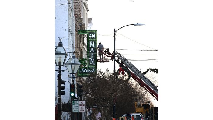 Natchez couple restores iconic Burns Shoe Store sign as Main Street bu...