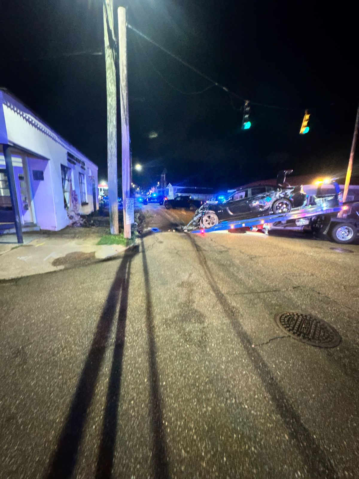 Natchez police respond after car hits Mackel Funeral Home an...