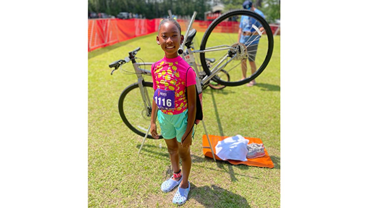 'Beating the boys,' Hardy following her father's triathlete footsteps
