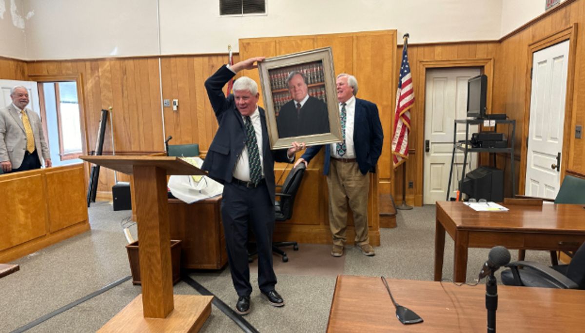 Adams County legal community gathers for hanging of official...