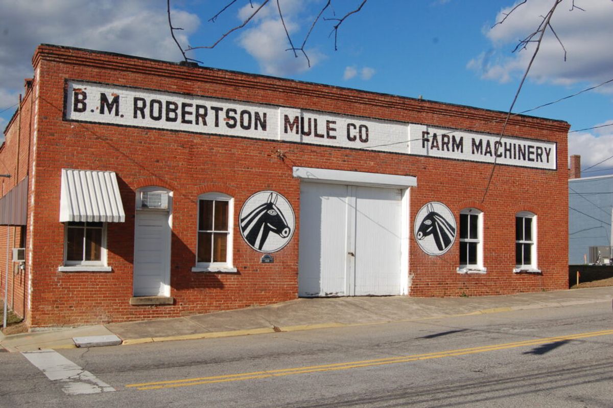 Clayton to buy former mule barn