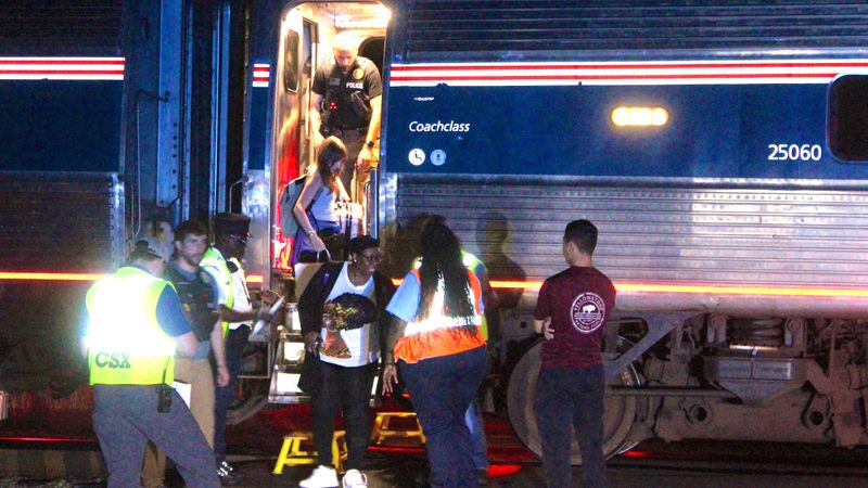 Train passenger hit by gunfire