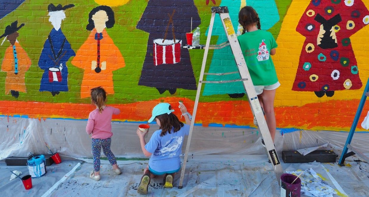 Help Paint a REVOLUTION OF JOY Mural!