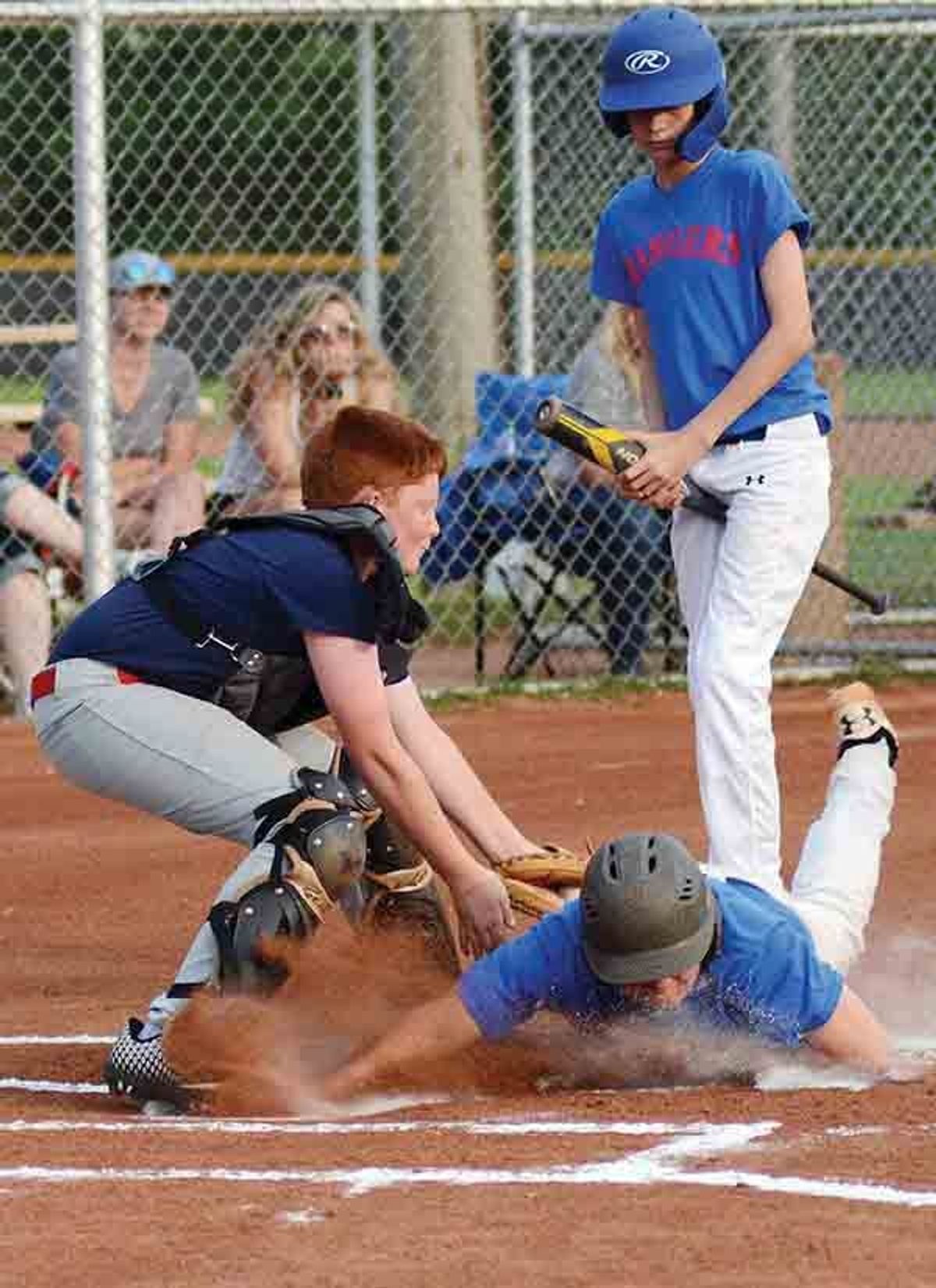Youth baseball action heats up