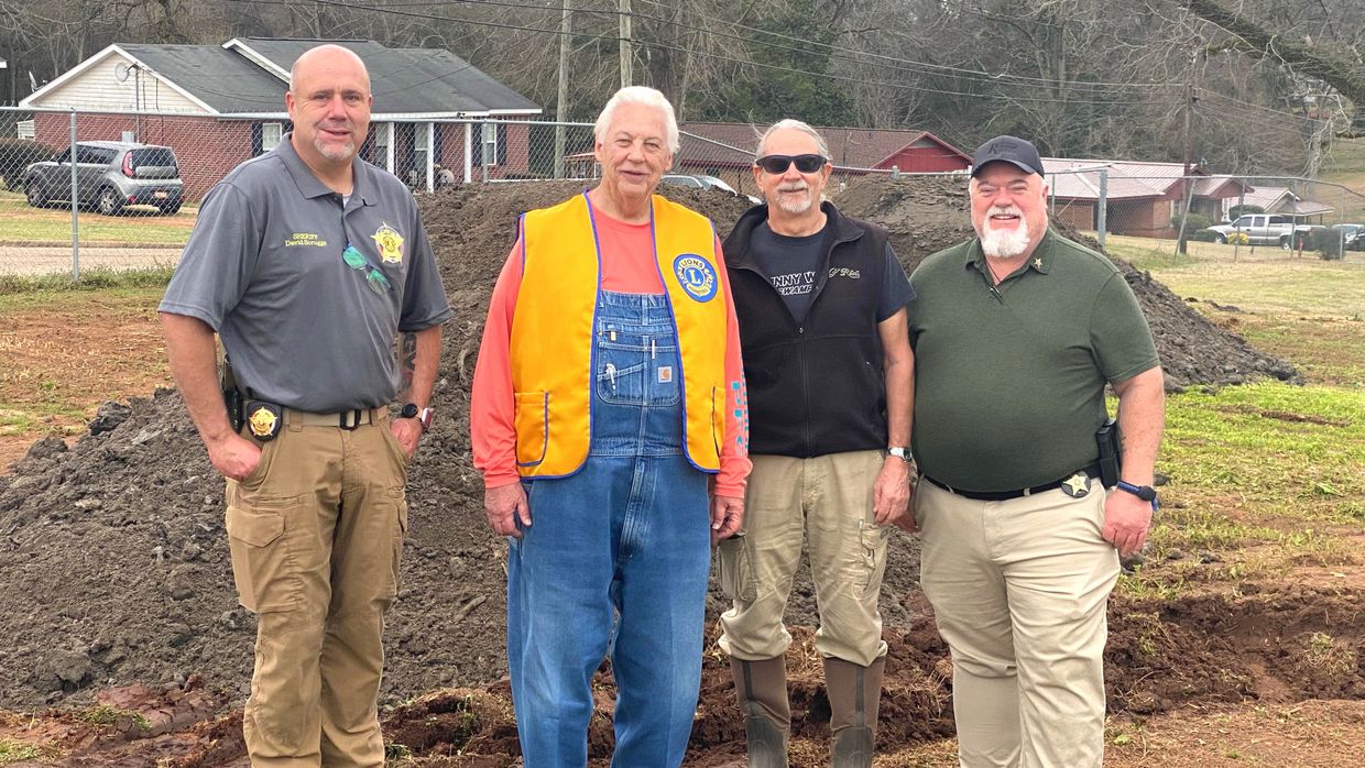 Lions deliver dirt for inmate garden