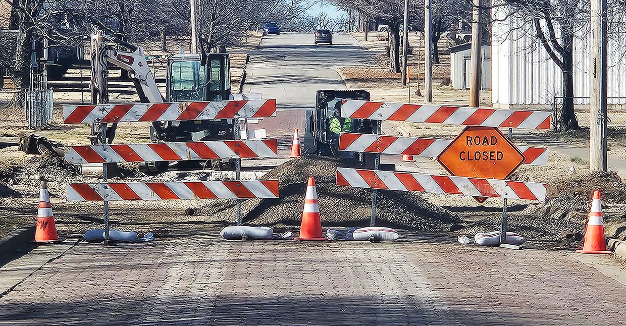 Traffic is detoured as road work continues