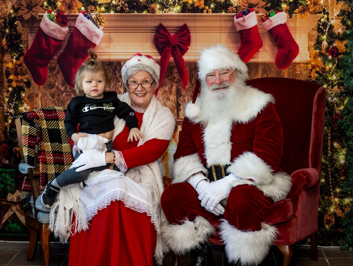 Santa, Mrs. Clause and an elf stop by EC Reed's Mercantile