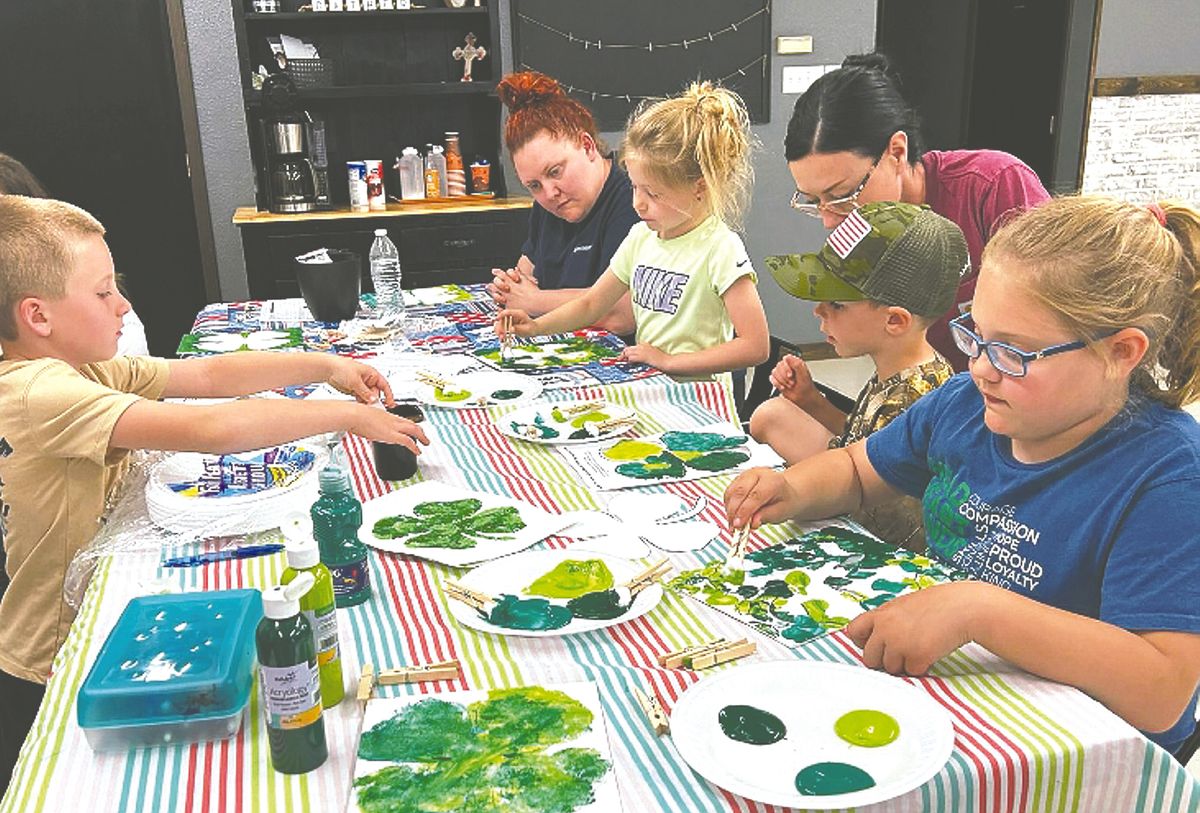 Patton 4-H Club Crafts Camo Clovers in Creative Spring Meeti...