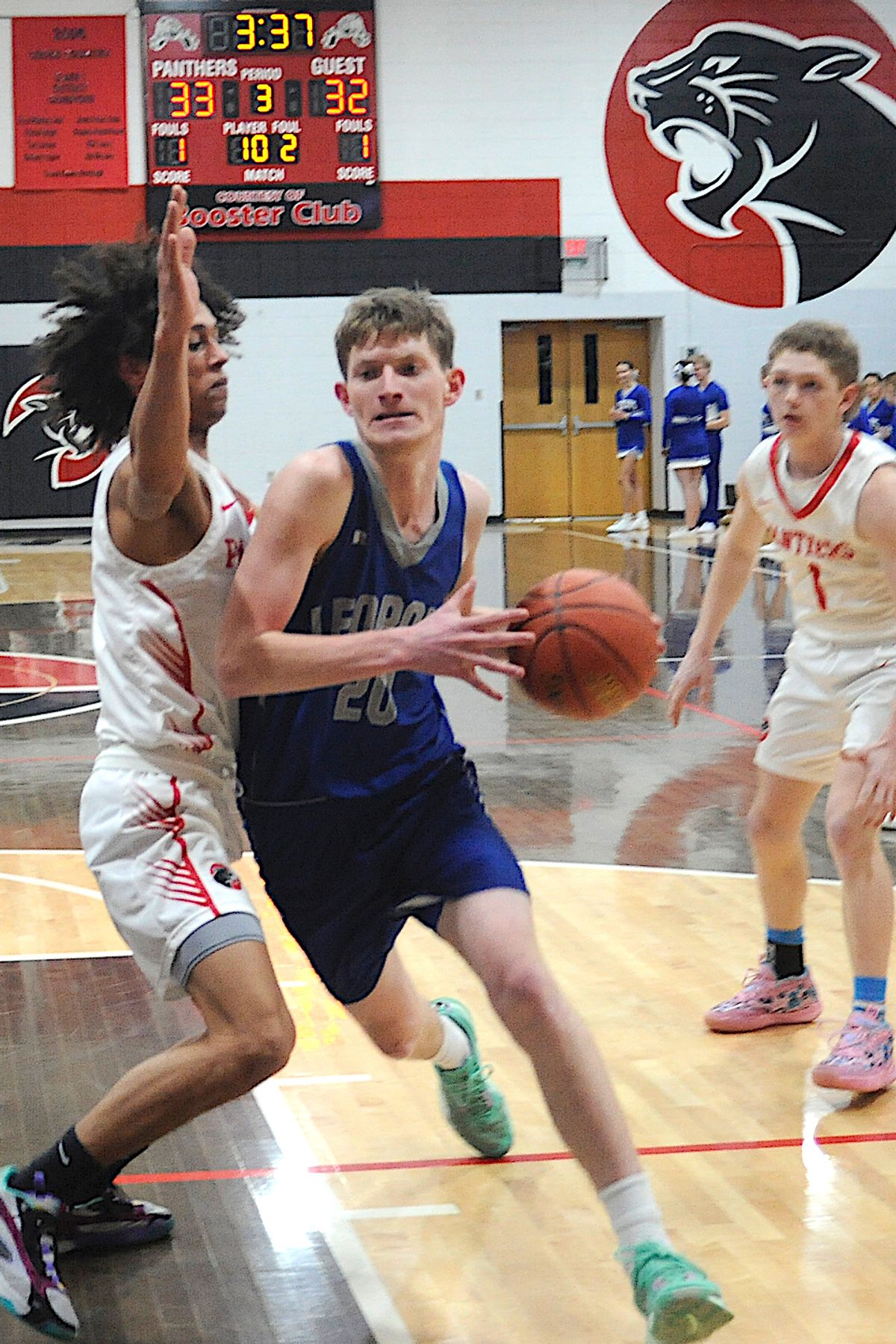 PHOTO GALLERY: Meadow Heights boys hoops outlasts Leopold in double OT