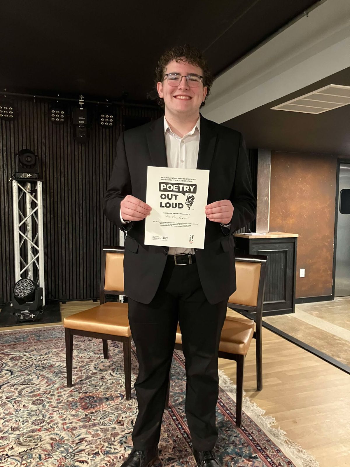 Gabriel competes in district poetry event