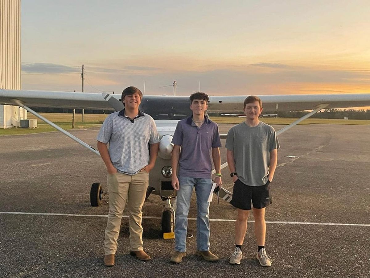 PLAS senior Bryant Swindall pilots flyover before Homecoming