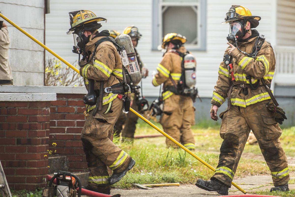 Residents escape house fire in Troy
