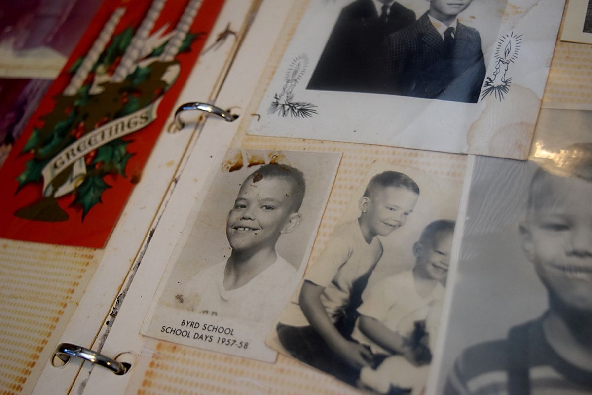Aging family photo album remains ‘unidentified object’