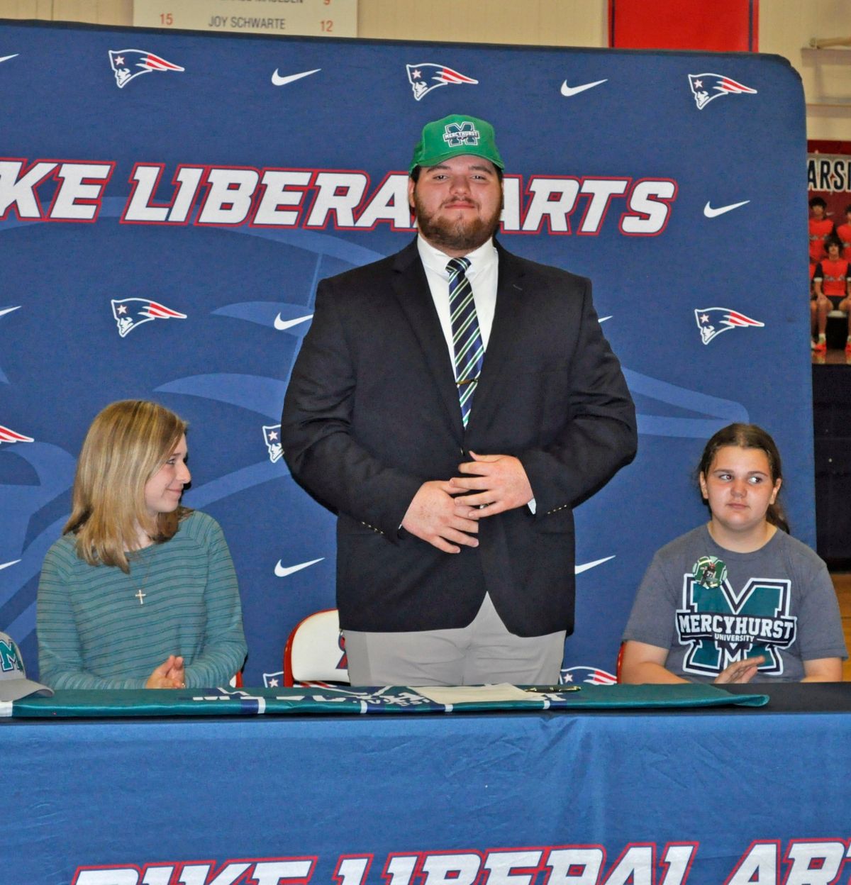 Pike Lib's Coy Bell signs football scholarship with Mercyhur...
