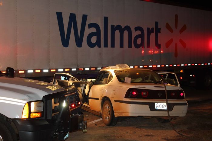 Woman airlifted after being trapped under 18-wheeler