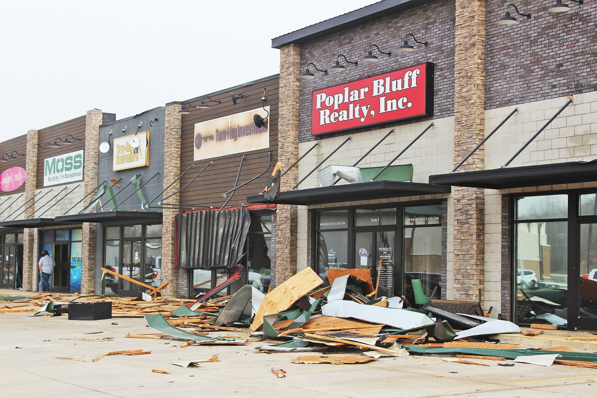 Photo gallery: Tornado leaves trail of destruction at busine...