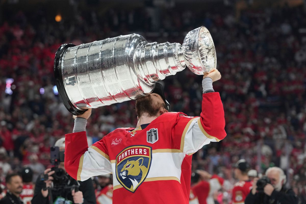 Photos of Panthers winning a second straight Stanley Cup, beating Oile...