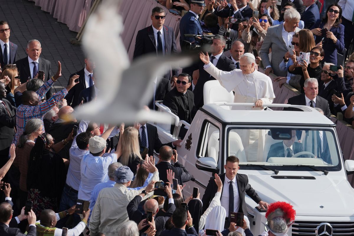 AP PHOTOS: Pope Leo XIV takes his first popemobile ride in S...