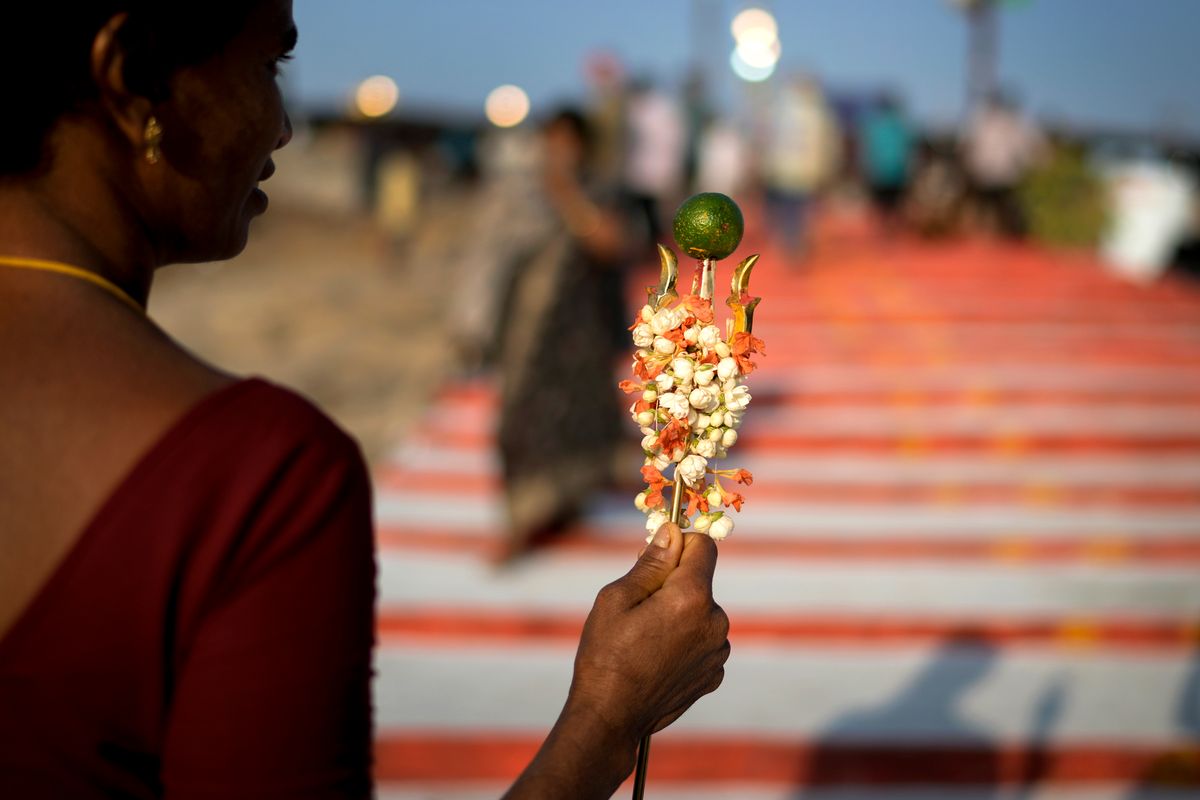 AP PHOTOS: Pilgrims make offerings to Hindu deities at a biennial fest...