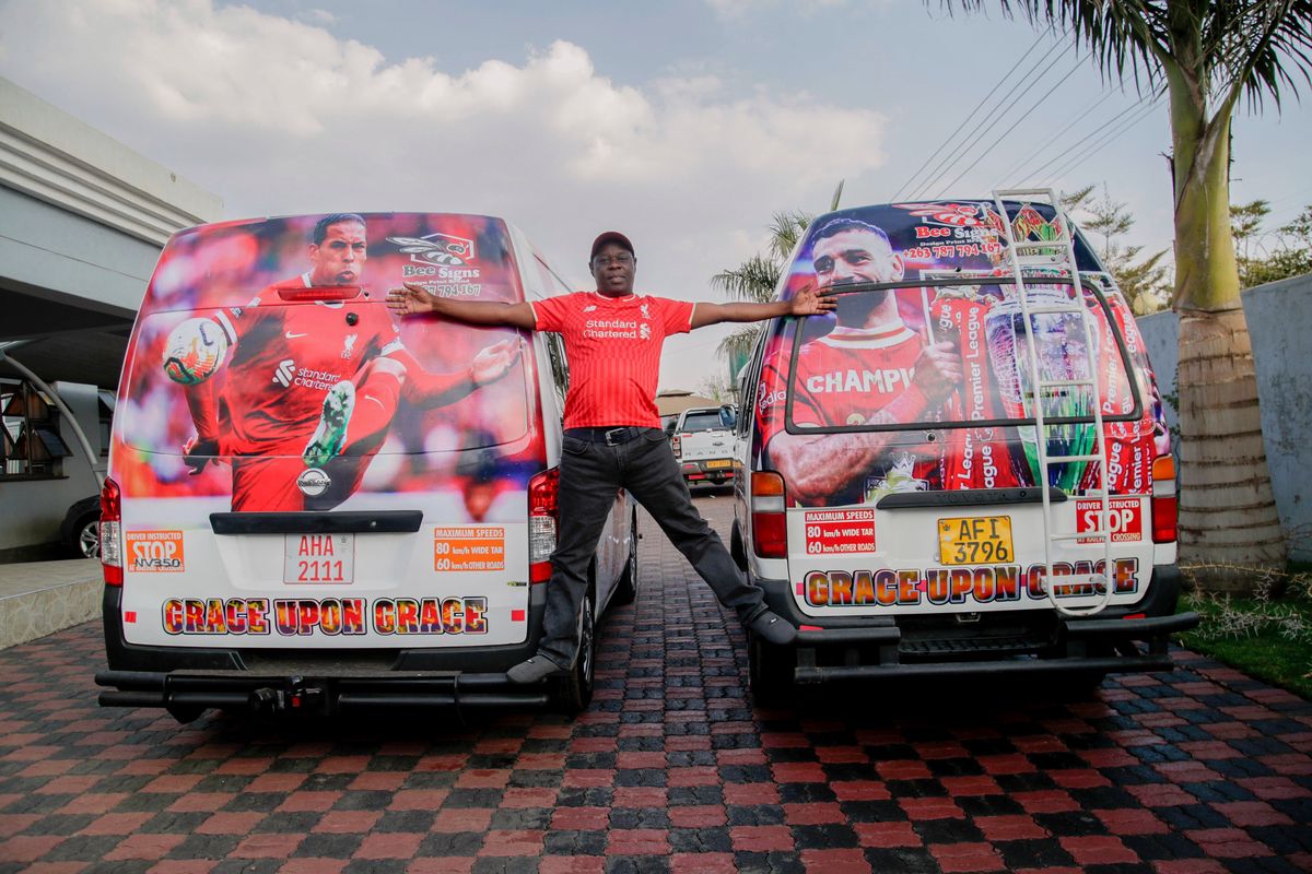 Photos of taxi drivers in Zimbabwe showing off team colors f...