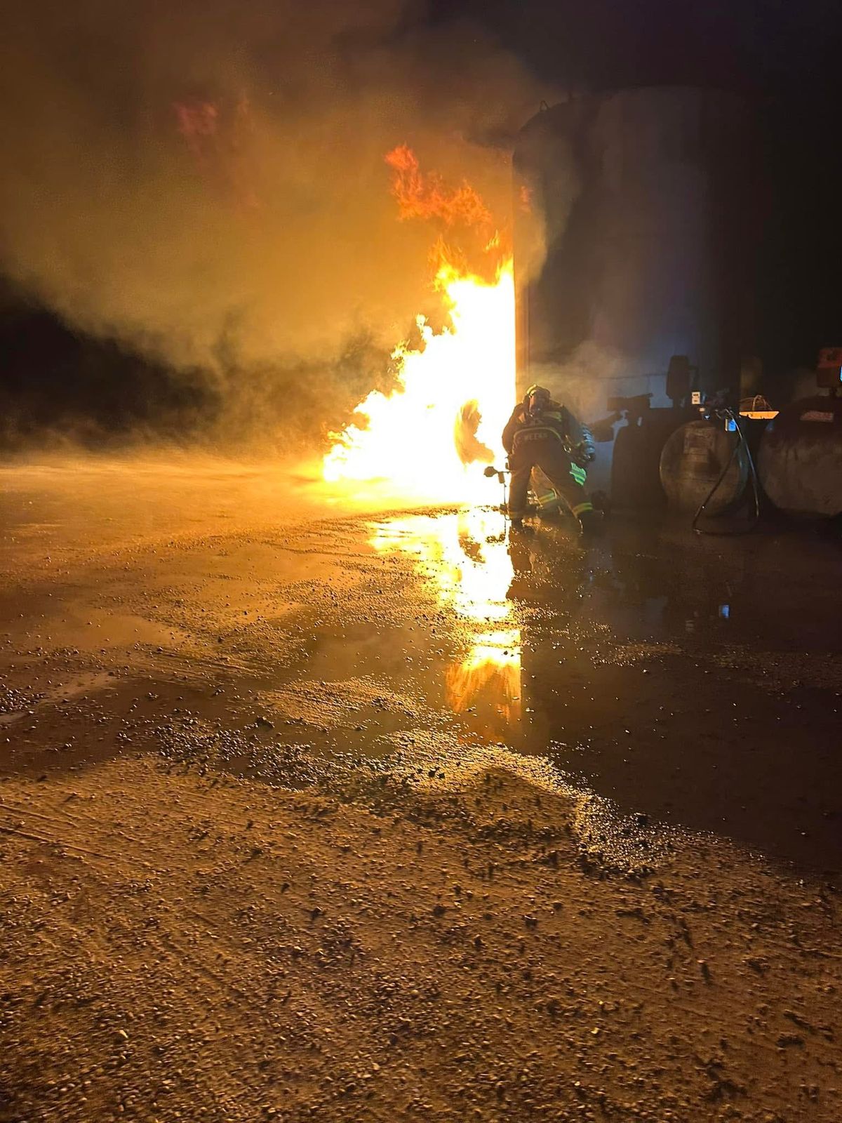 Hazardous fuel tank fire contained by firefighters, no injuries report...