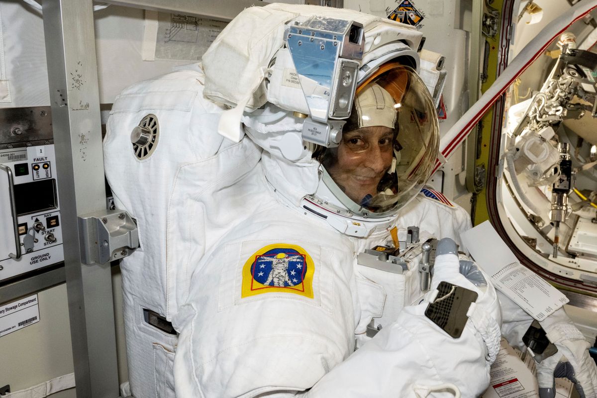 NASA's stuck astronaut steps out on a spacewalk after 7 mont...