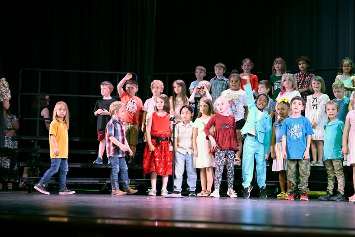 Class of 2037 walks across the stage in kindergarten graduation