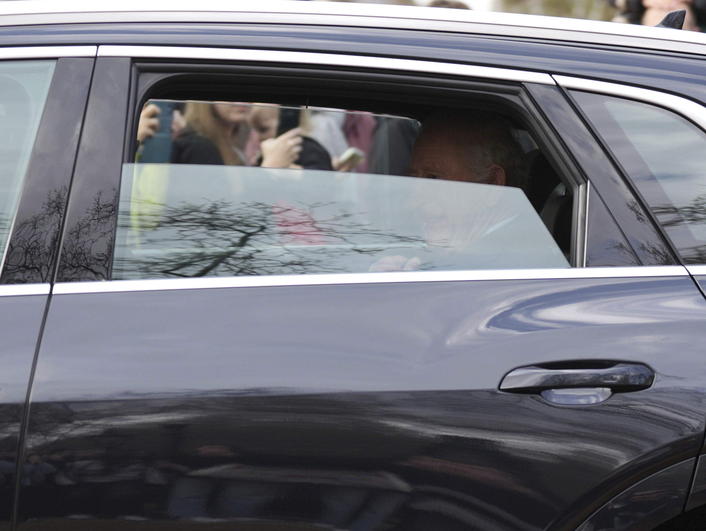 King Charles III seen in public one day after hospitalization for canc...