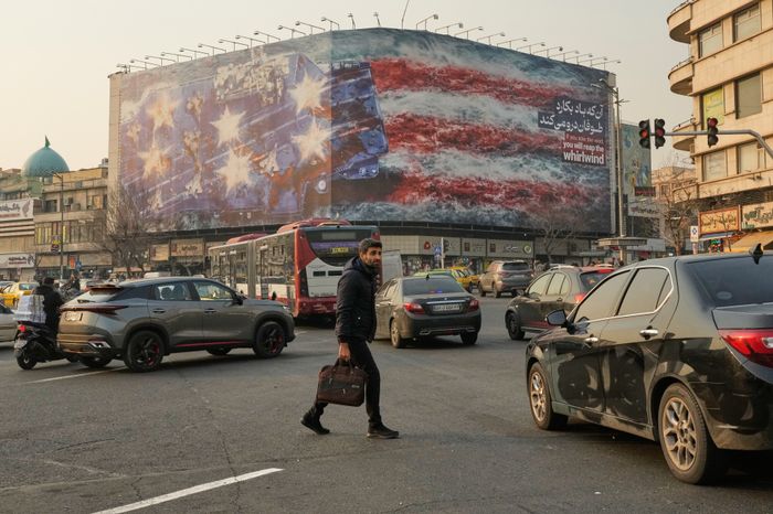 Iran unveils mural warning of retaliation if US conducts a military st...