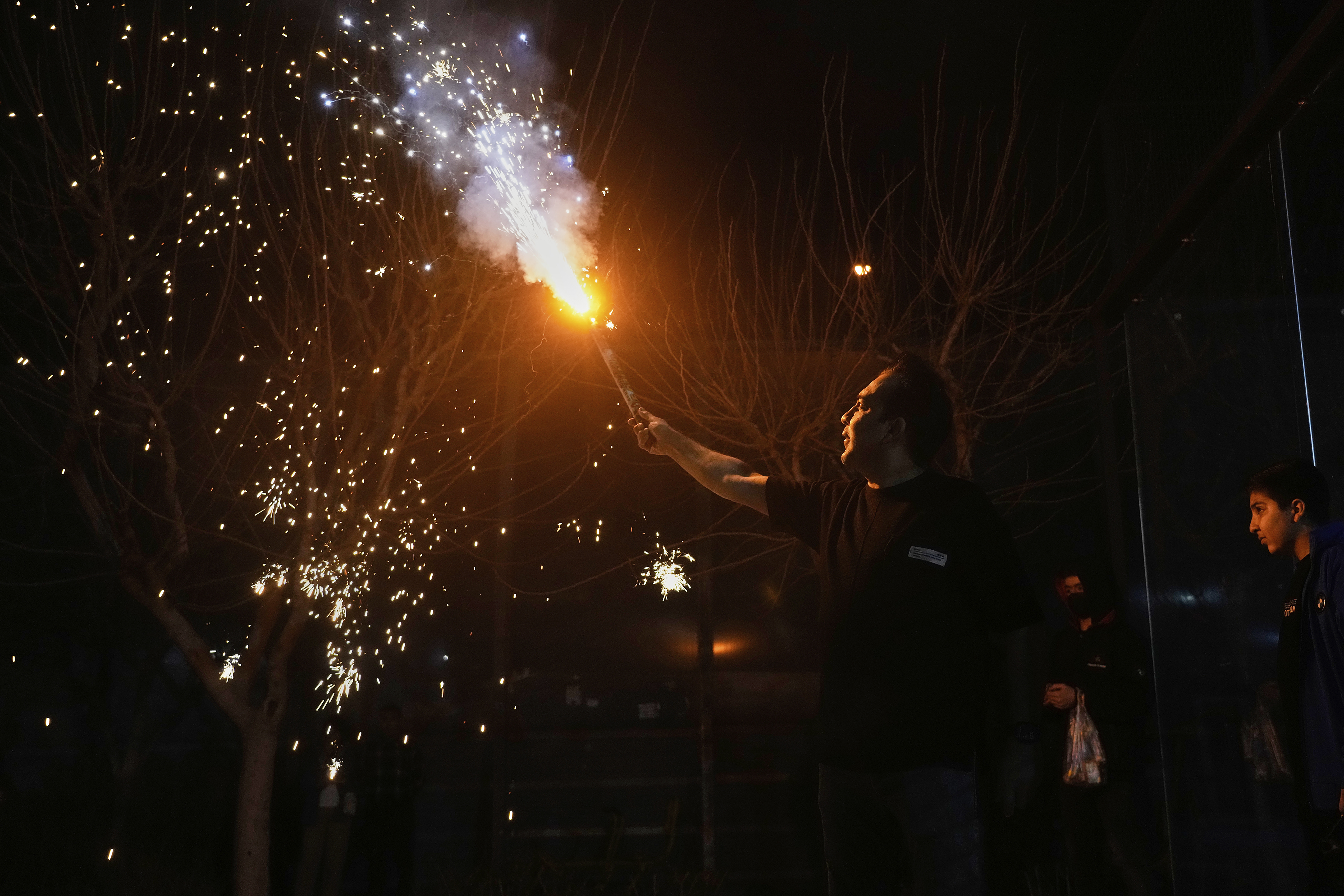 Iran celebrates ancient fire festival ahead of Persian New Year as ten...