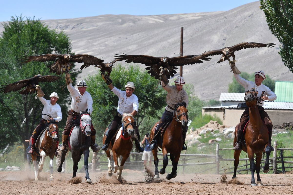 Photos from Kyrgyzstan show traditional hunters with eagles at the Sal...