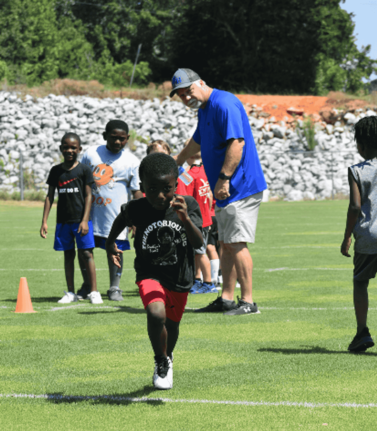 Inaugural football camp brings skills, inspiration