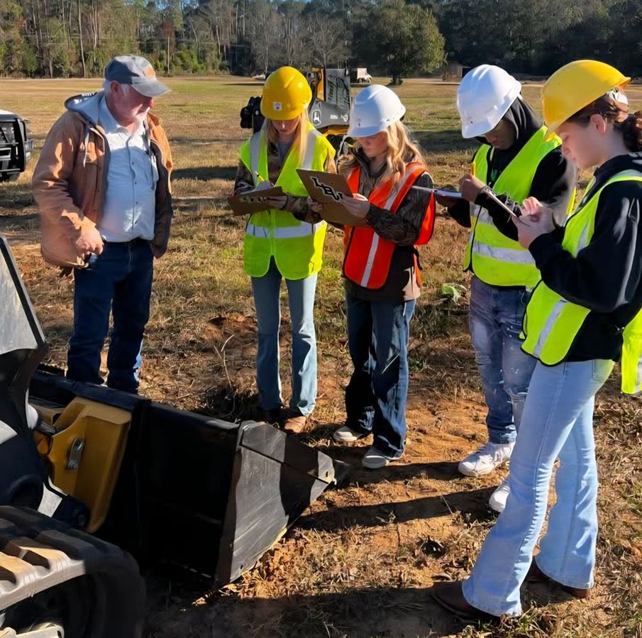 Students qualify as skid steer credentials