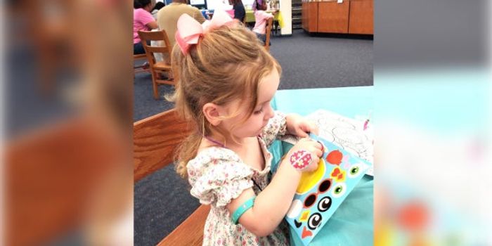 Easter Bunny makes annual library visit