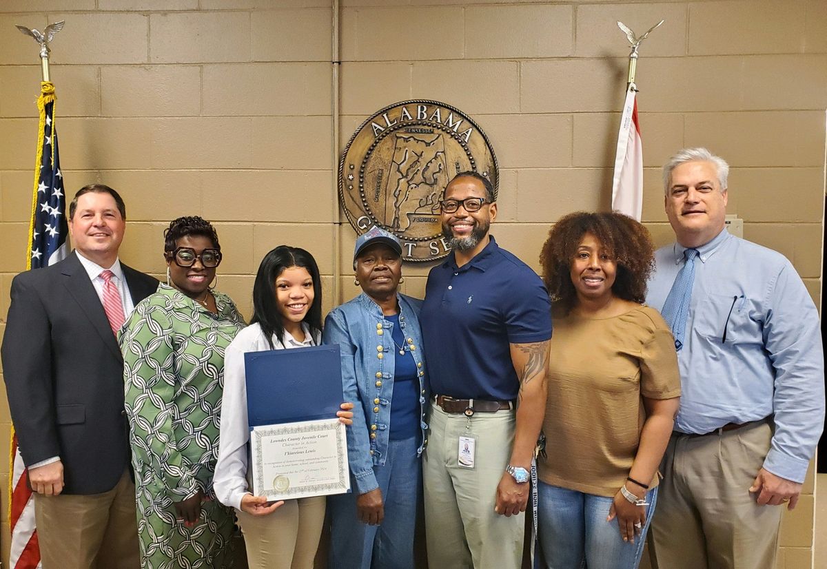 Lewis exemplifies resilience, awarded for Character in Actio...