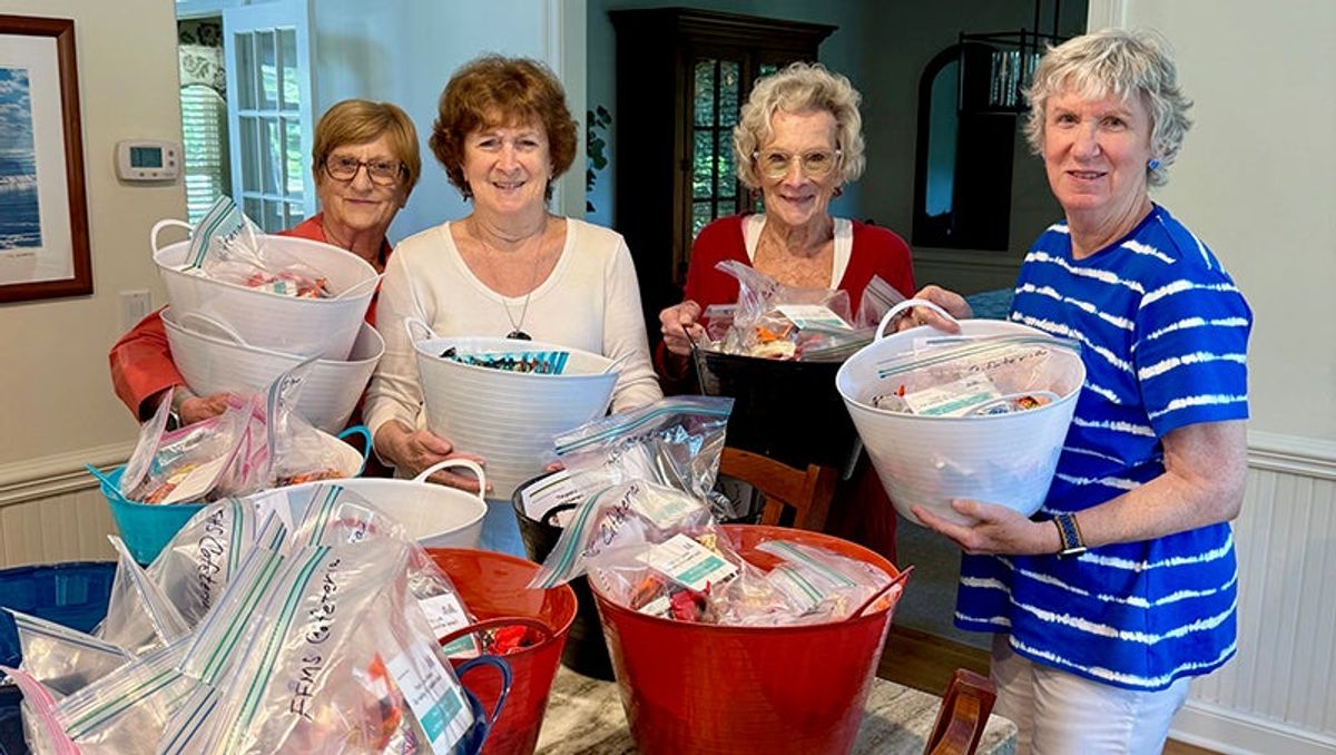 Dare NCRSP members present baskets of sweet treats to DCS teachers, st...