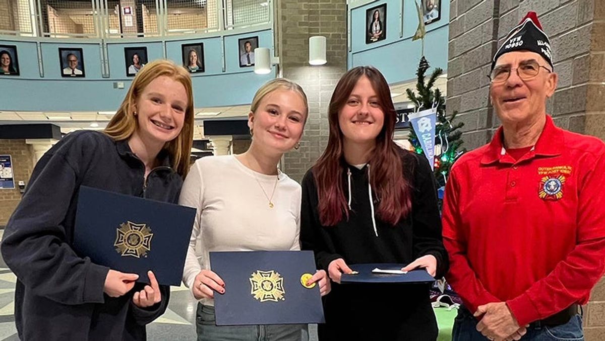First Flight High School students awarded certificates, checks for VFW...