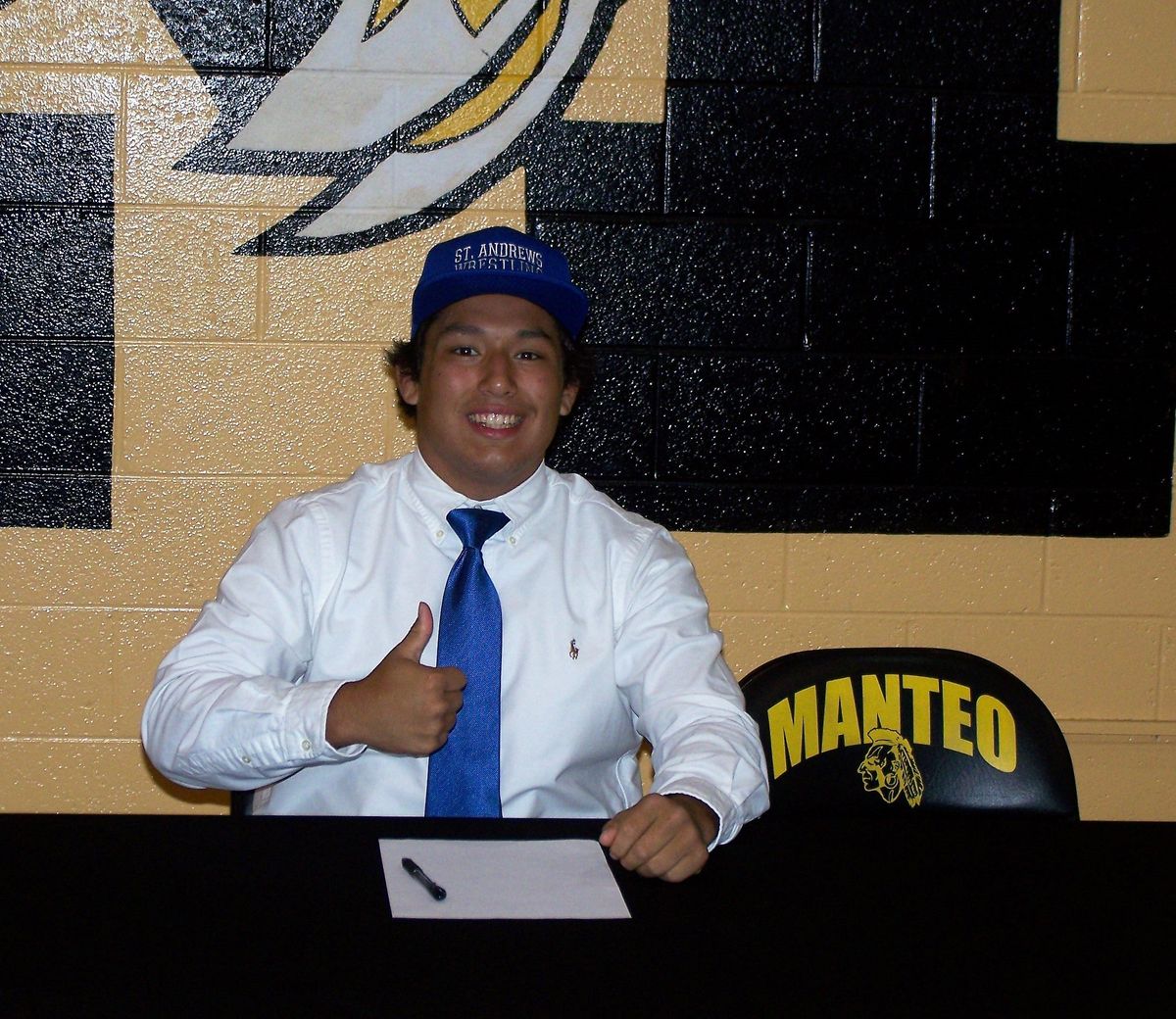 Manteo High wrestler signs with St. Andrews