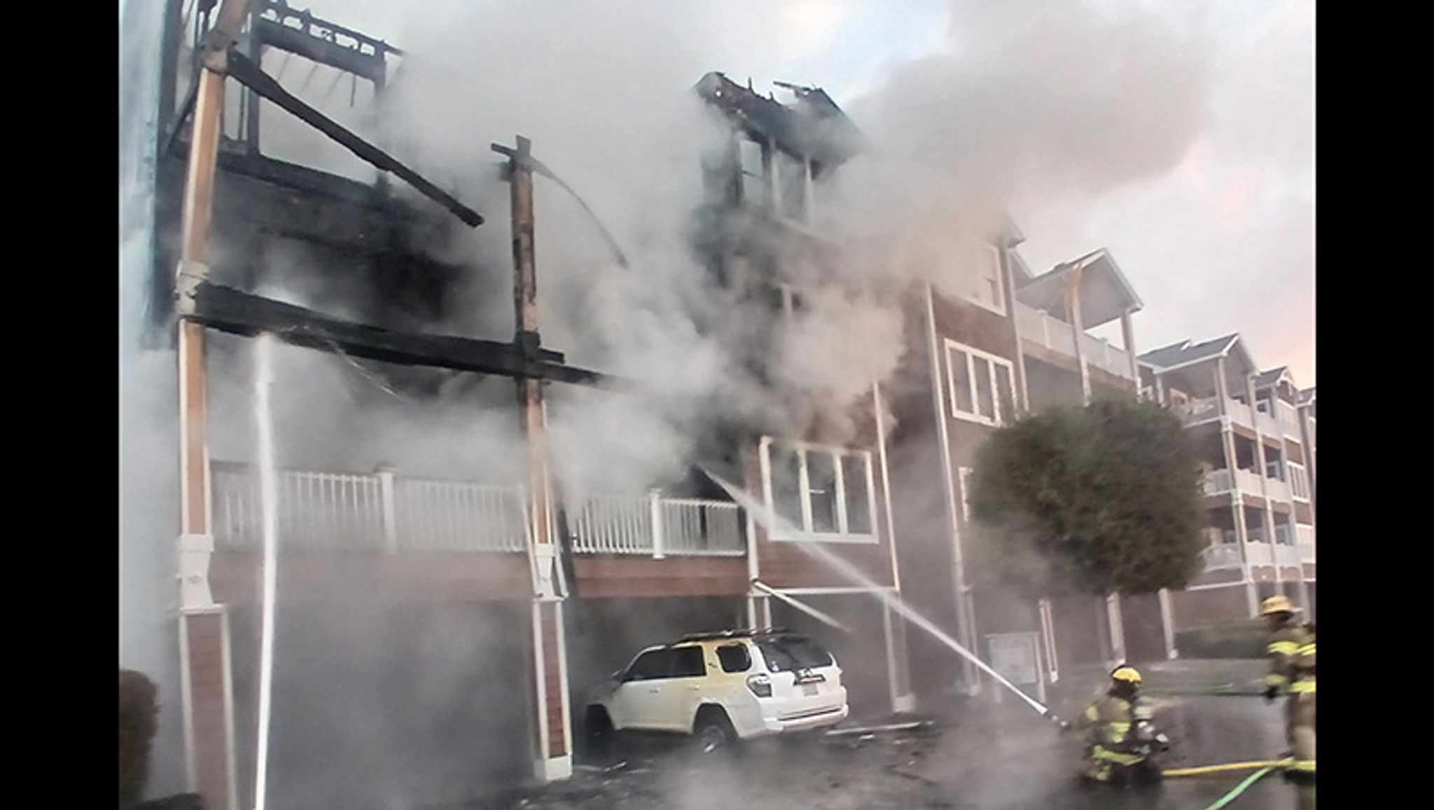 Crews battling fire at Shallowbag Bay Club condos in Manteo