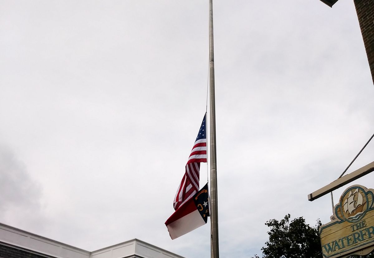 Flags lowered for slain Highway Patrol trooper