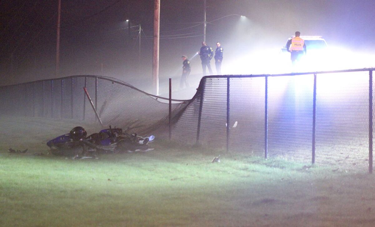 Motorcycle crash damages dog park fence