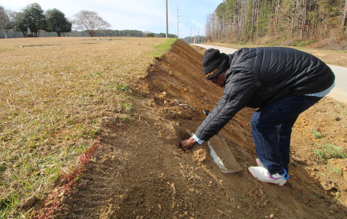 ‘Truly a headstone’: Marker uncovered at Vick Cemetery during drainage...