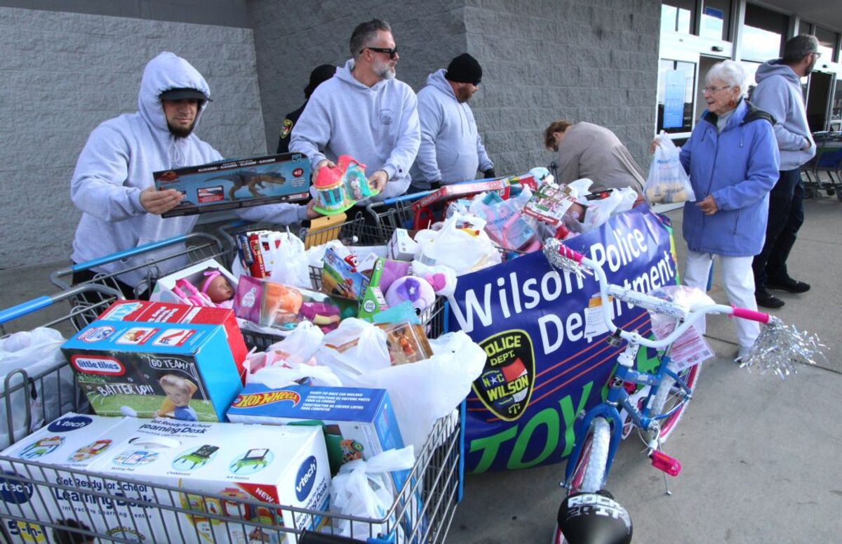 Police collecting toys for Christmas in the South