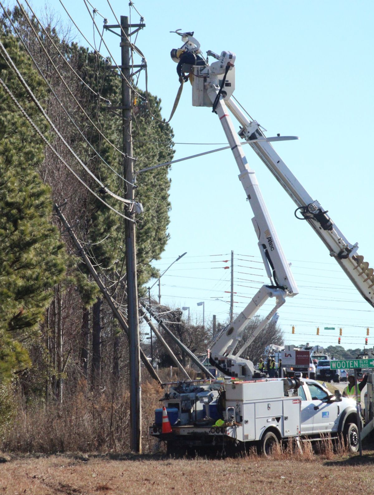 5 downed utility poles lead to road closure