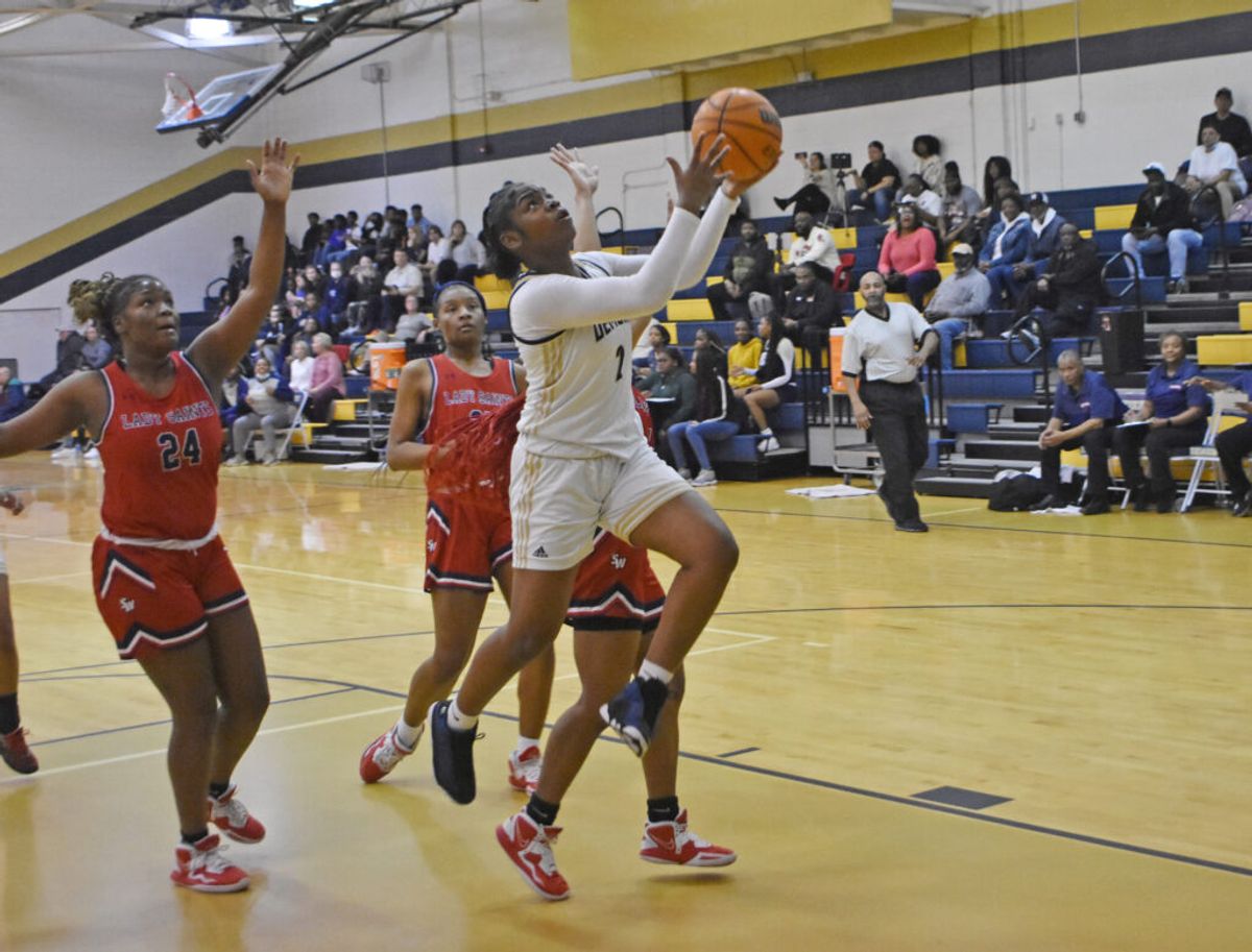 Demons rout Saints to seize 3-A Quad County title