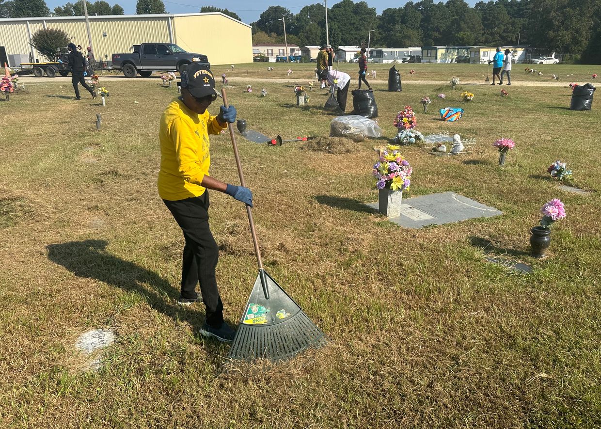 Volunteers work to clean up Hamilton Burial Garden