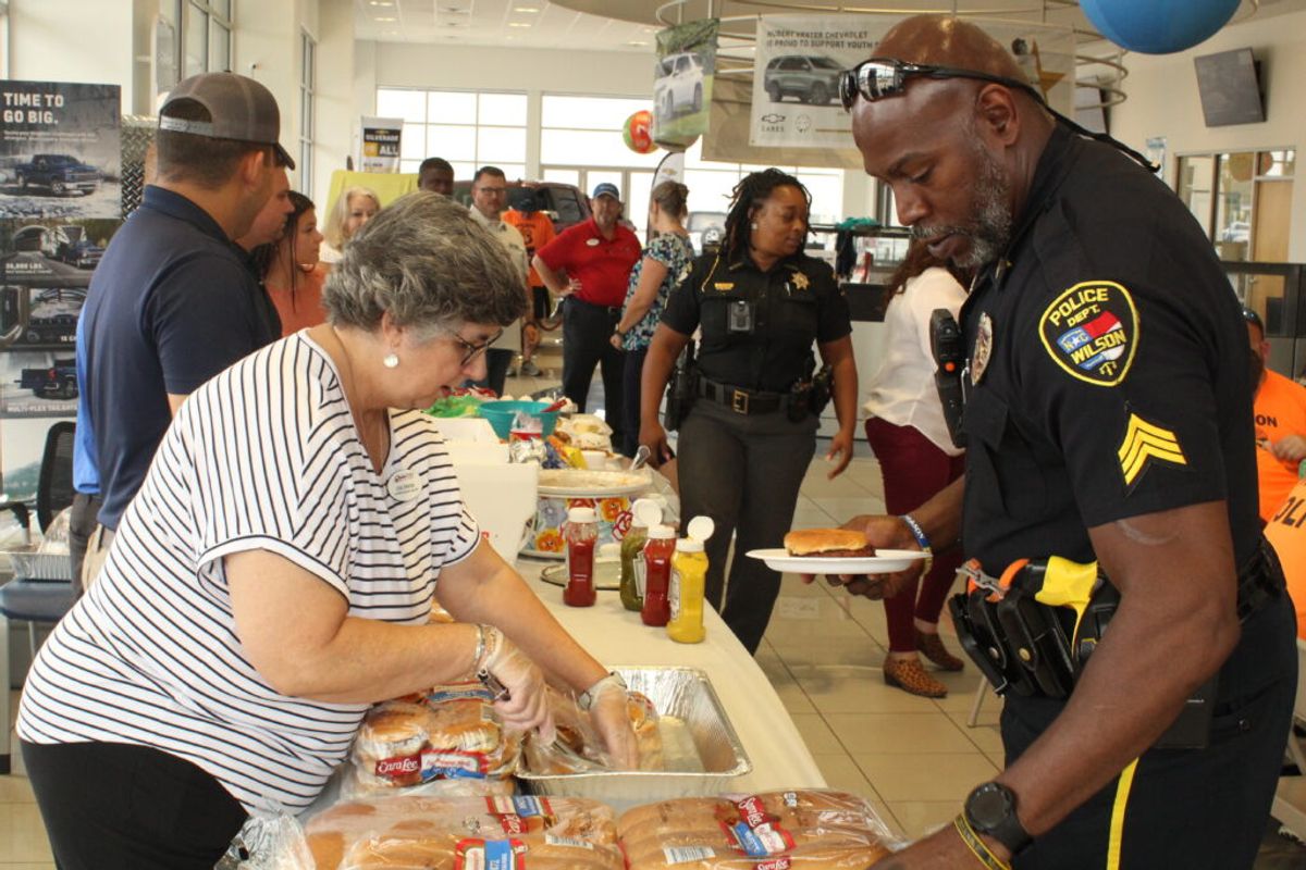 Vester Auto Group treats Wilson first responders to cookout